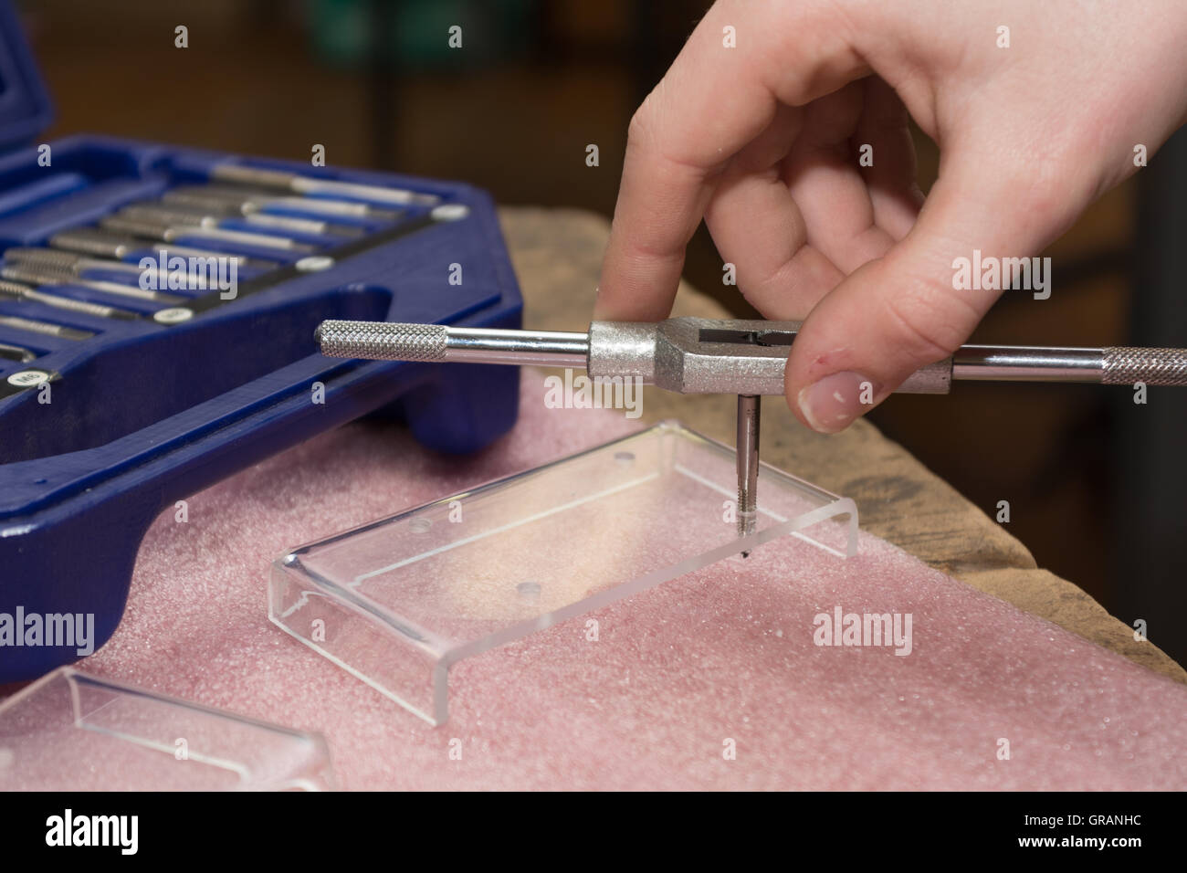 Tappers In Acrylic Glass In Use Stock Photo - Alamy