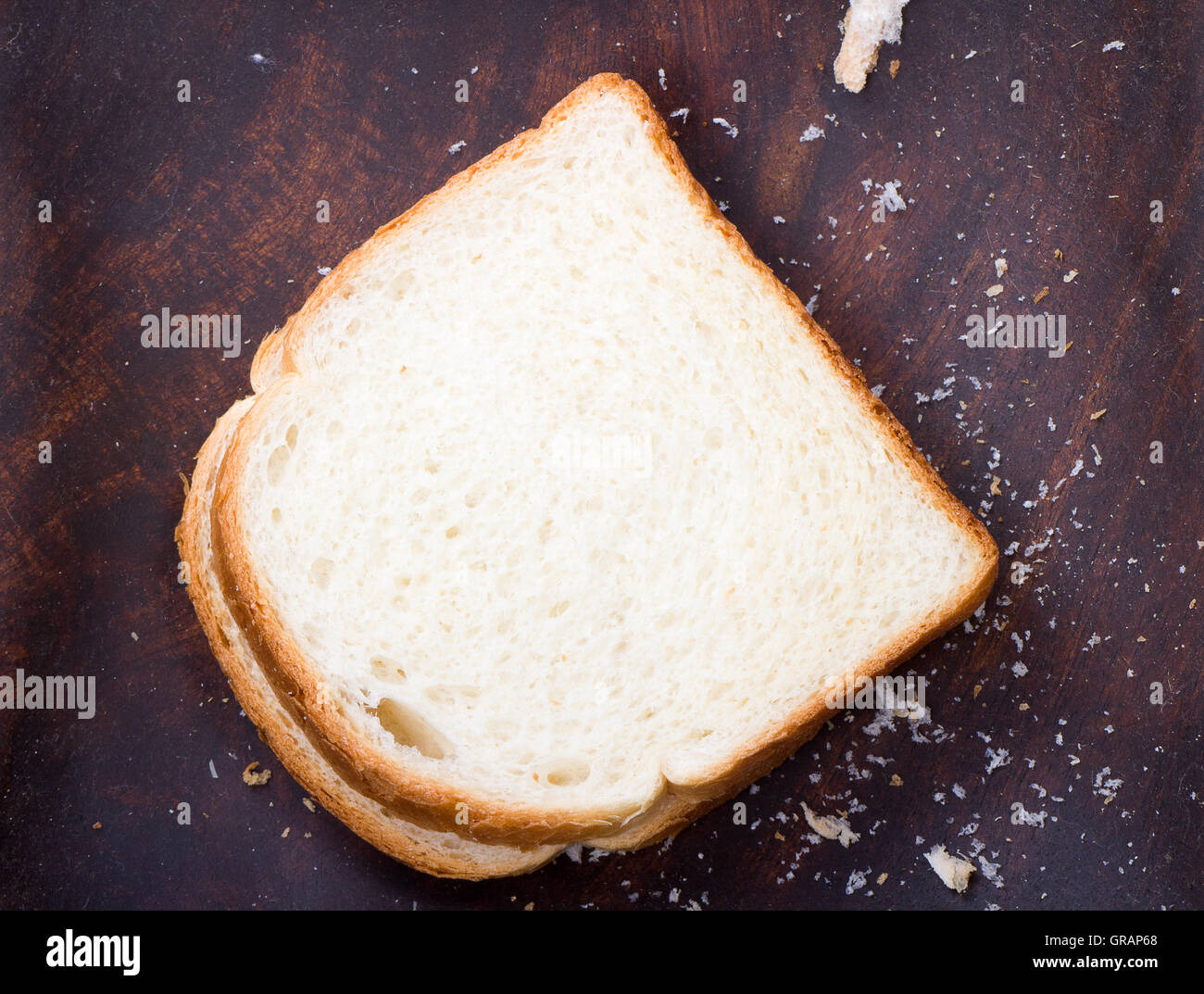 bread in kitchen on a dark background Stock Photo - Alamy