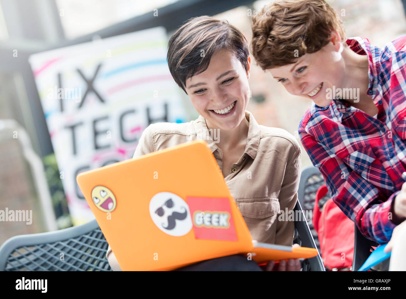 Laptop smiling technology hi-res stock photography and images - Alamy