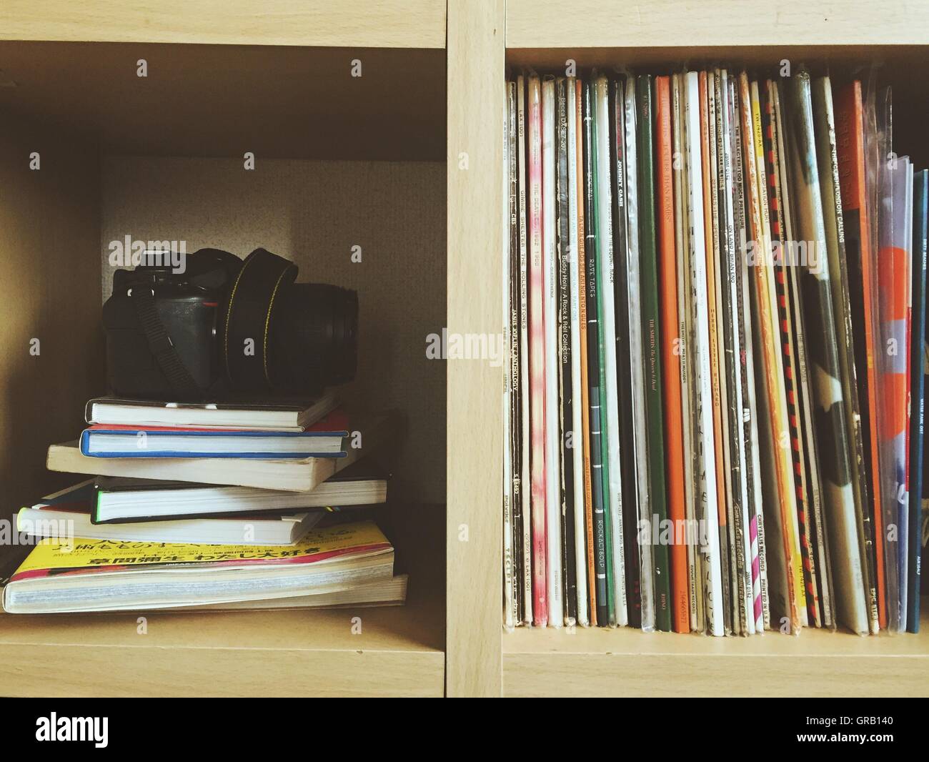 Stack Of Books In Shelf Stock Photo - Alamy