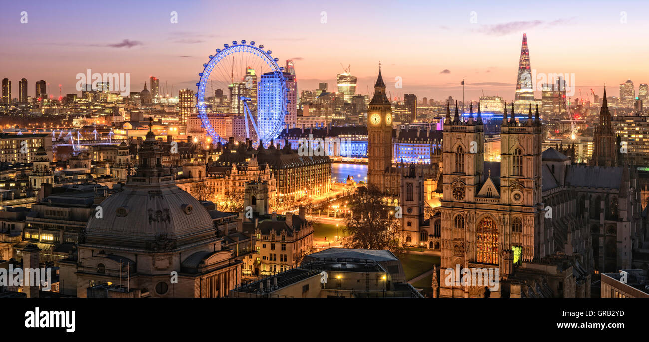 London's skyline at daybreak from the roof tops. The iconic London ...