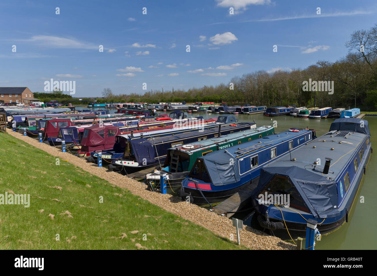 Lines of narrowboats moored at Blisworth Marina, Northamptonshire, UK ...
