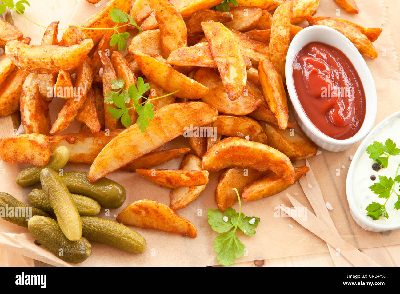 Potato Wedges With Dip Stock Photo - Alamy