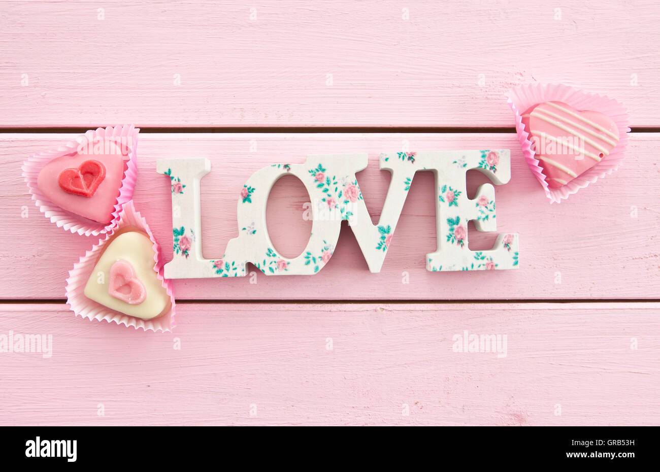 Love On Pink Stock Photo - Alamy