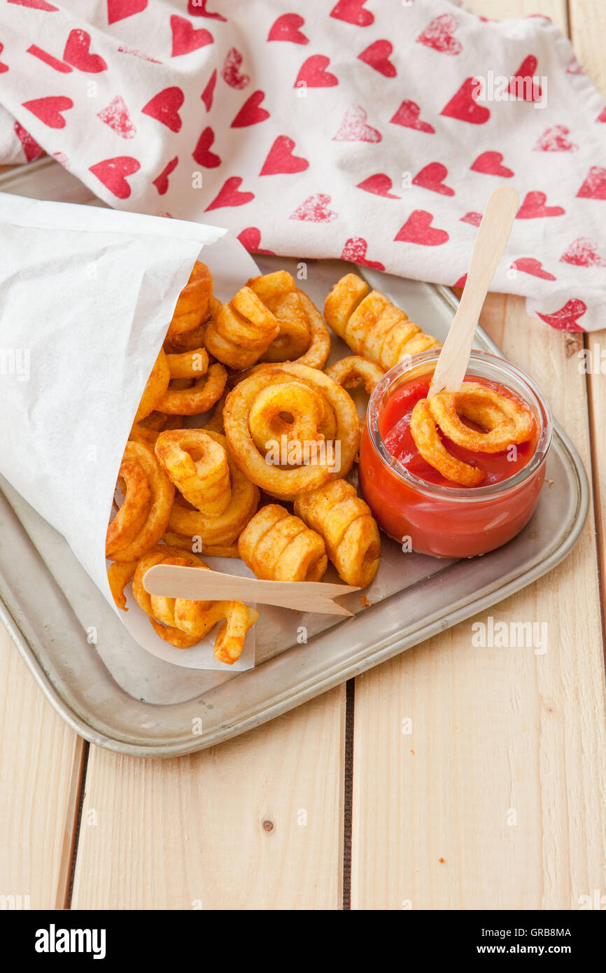 Curly fries dipping hi-res stock photography and images - Alamy