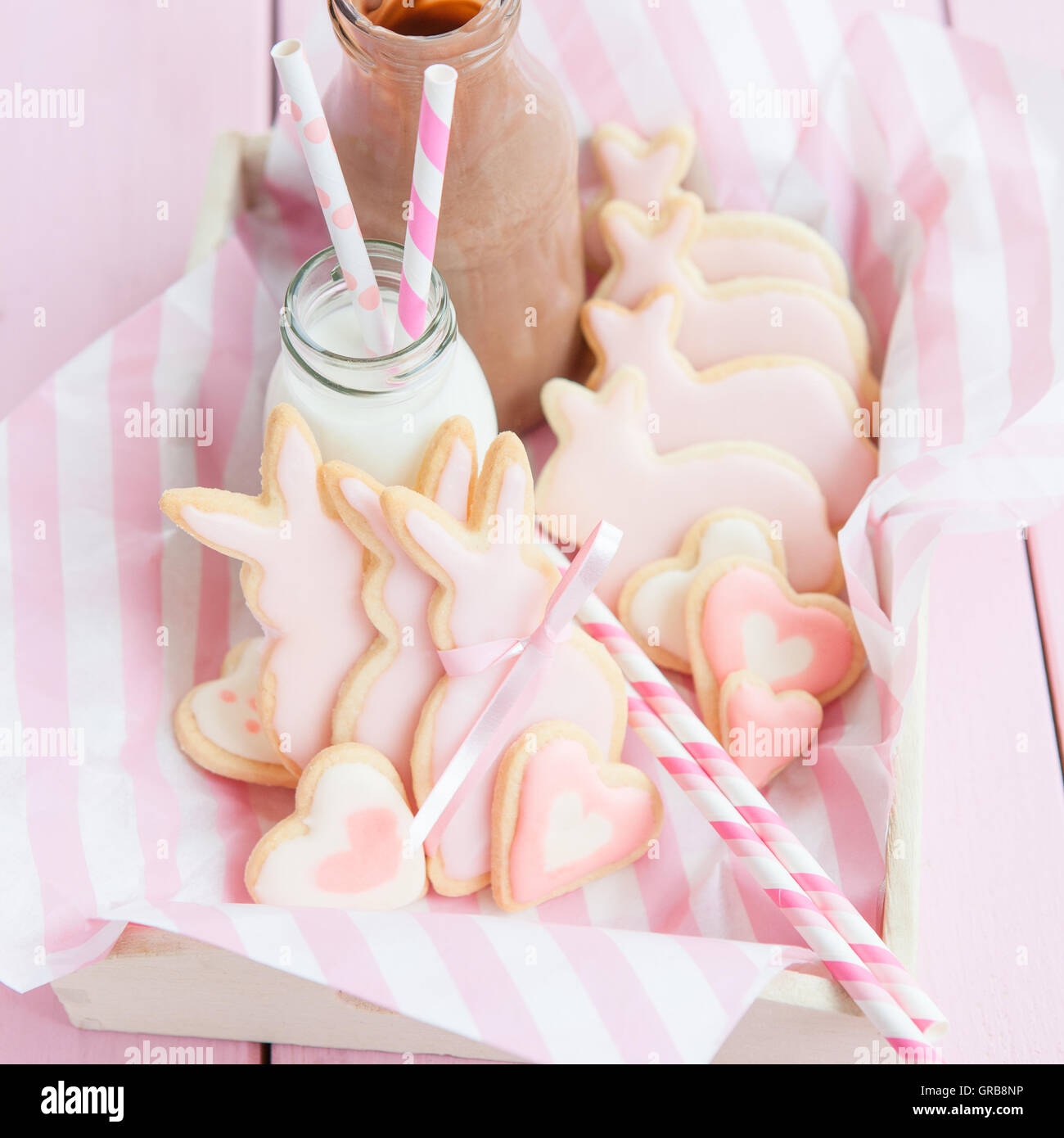 Pink Cookies And Milk Stock Photo - Alamy