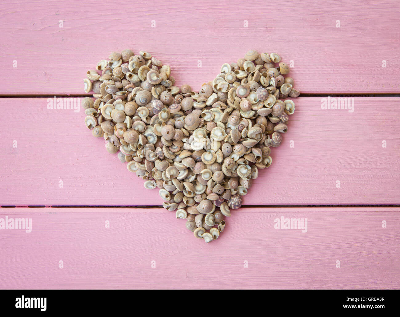 Sea Shells In A Heart Shape Stock Photo - Alamy