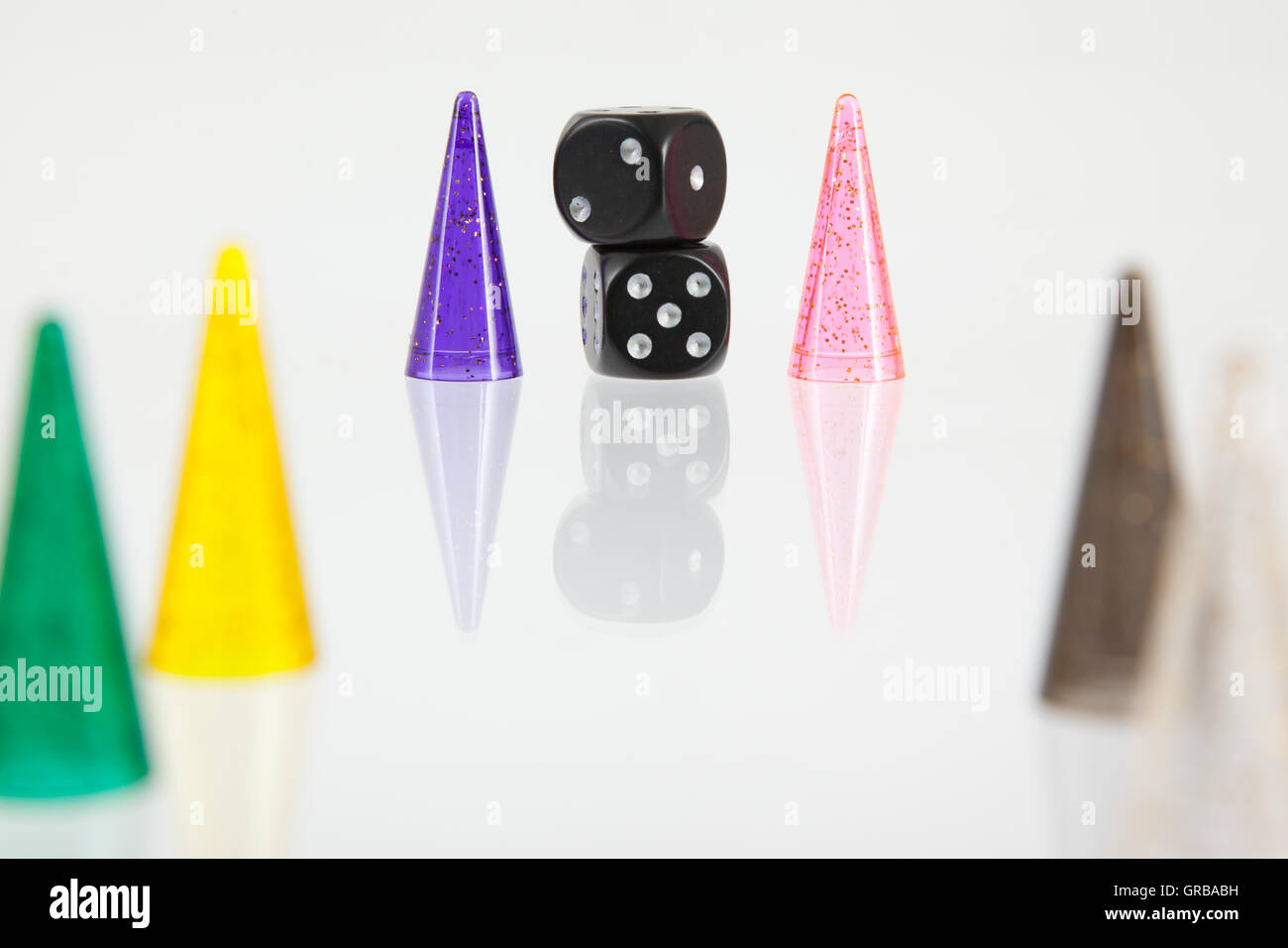 Different colored pawns isolated Stock Photo - Alamy