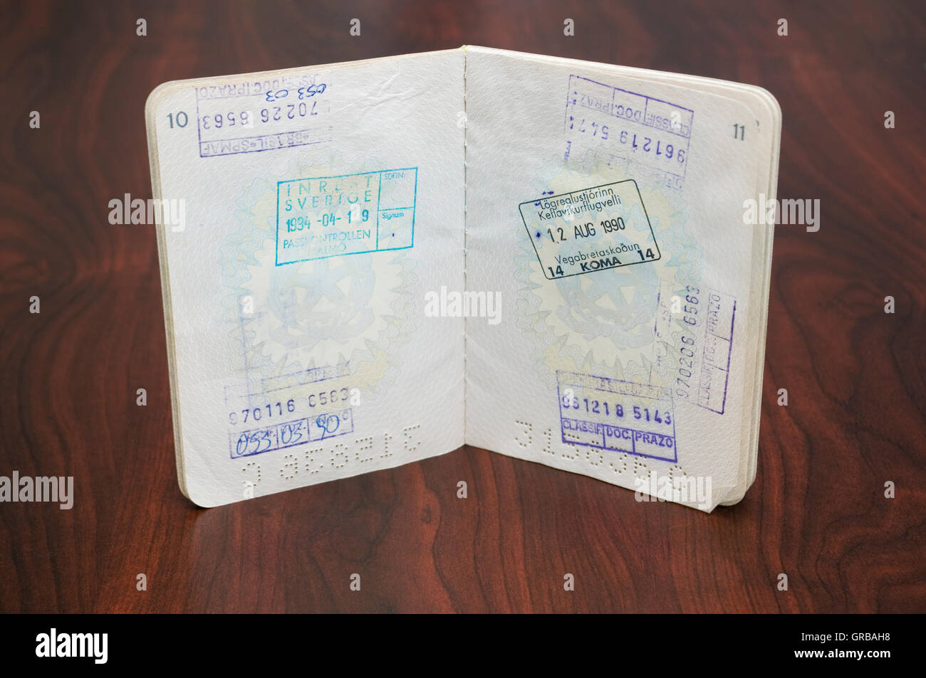 Open Passport With Stamps Stock Photo - Alamy