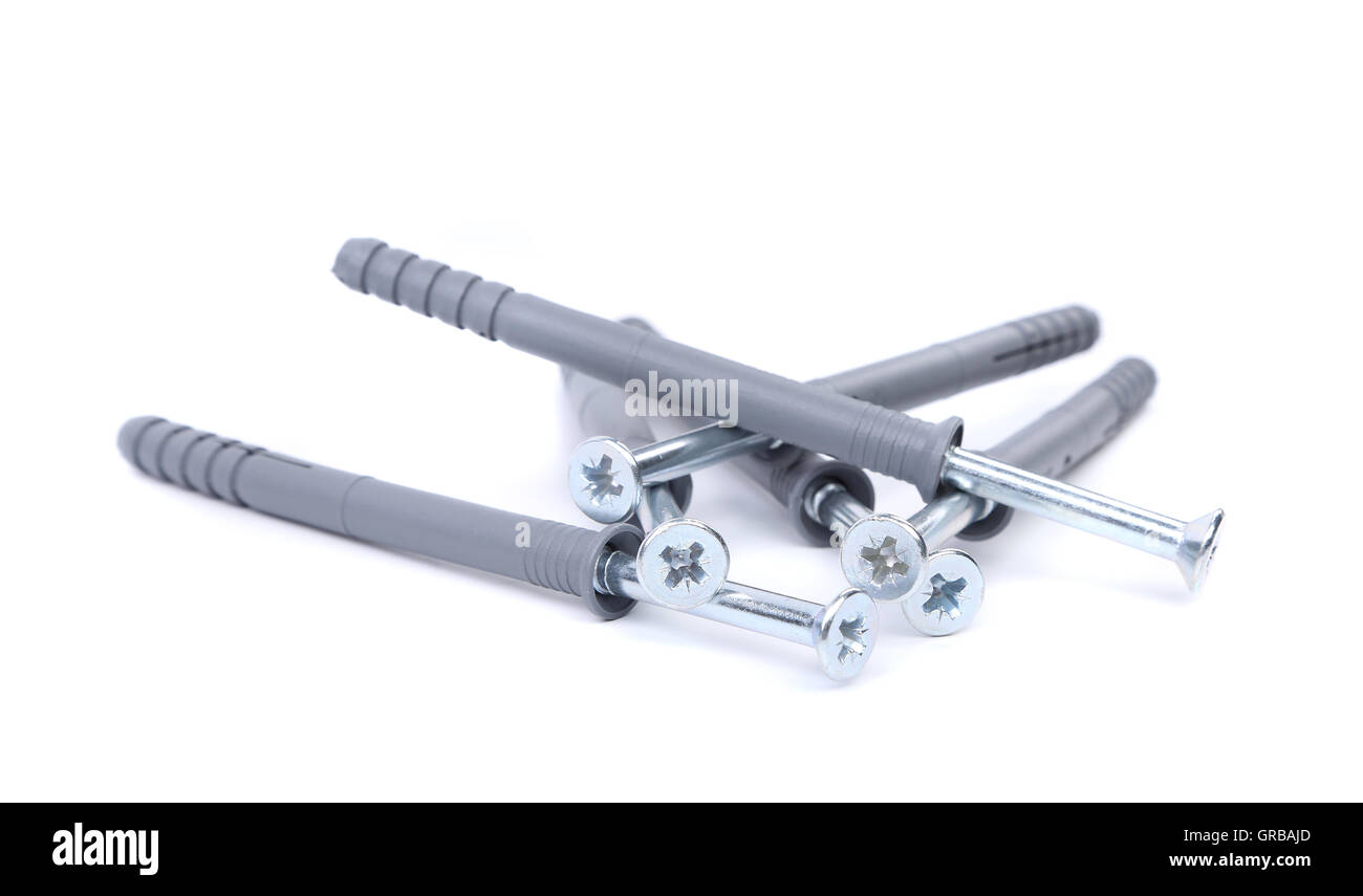 Screws and dowels isolated on white background Stock Photo - Alamy