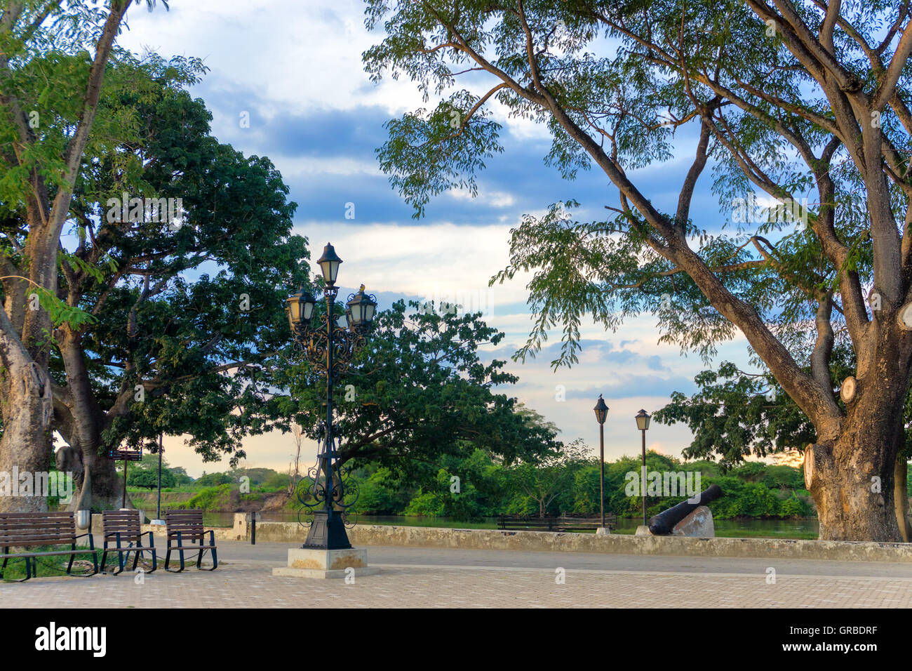 Park on the waterfront in Mompox, Colombia Stock Photo - Alamy