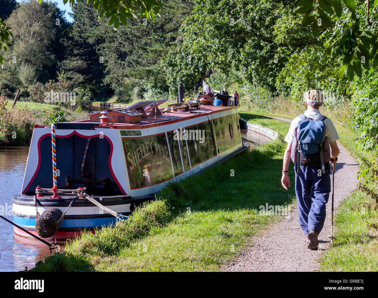 Senior Man Walking Along Canal Towpath Stock Photo - Alamy
