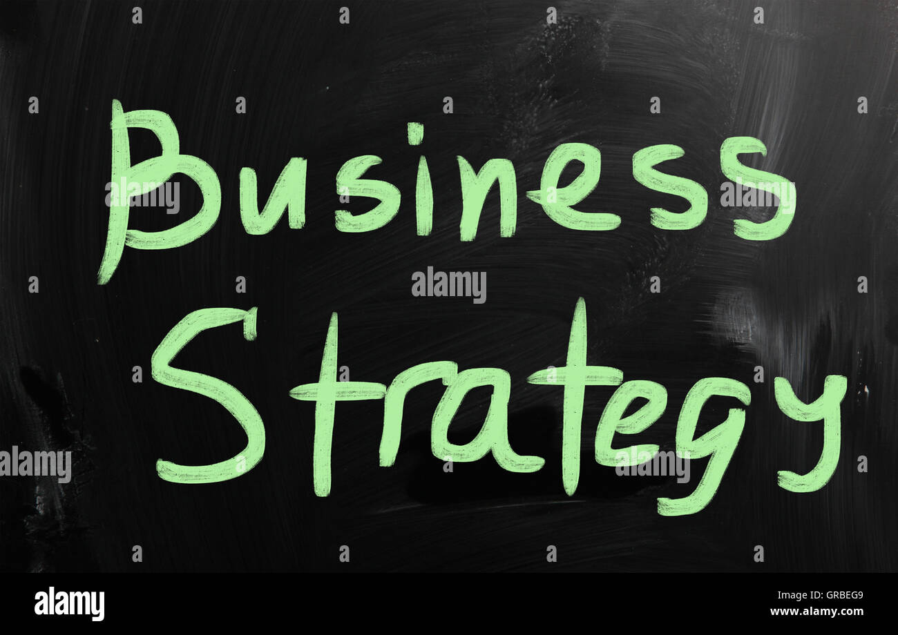 Strategy handwritten with white chalk on a blackboard Stock Photo - Alamy
