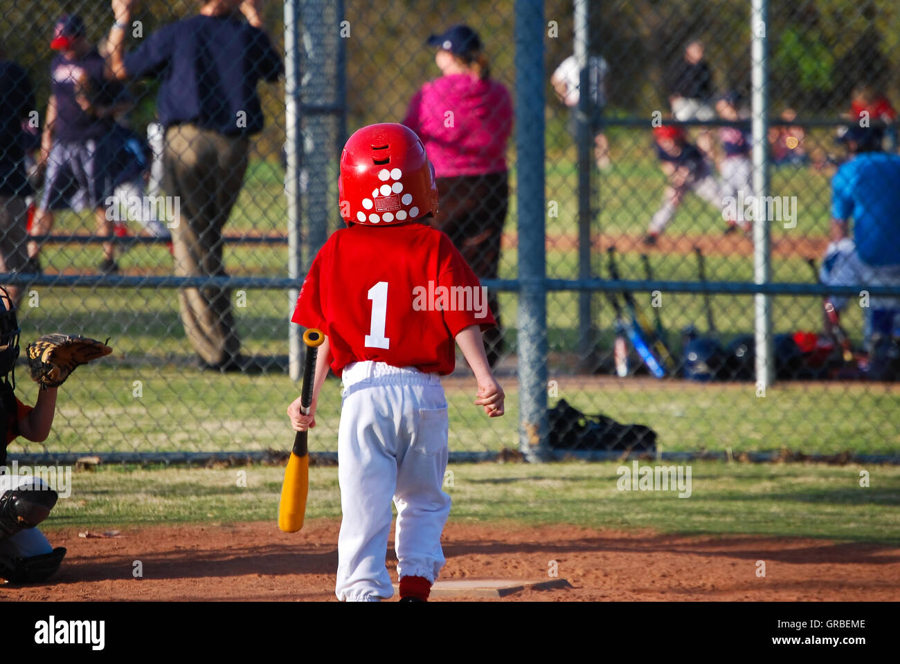 Little league batter from behind Stock Photo - Alamy