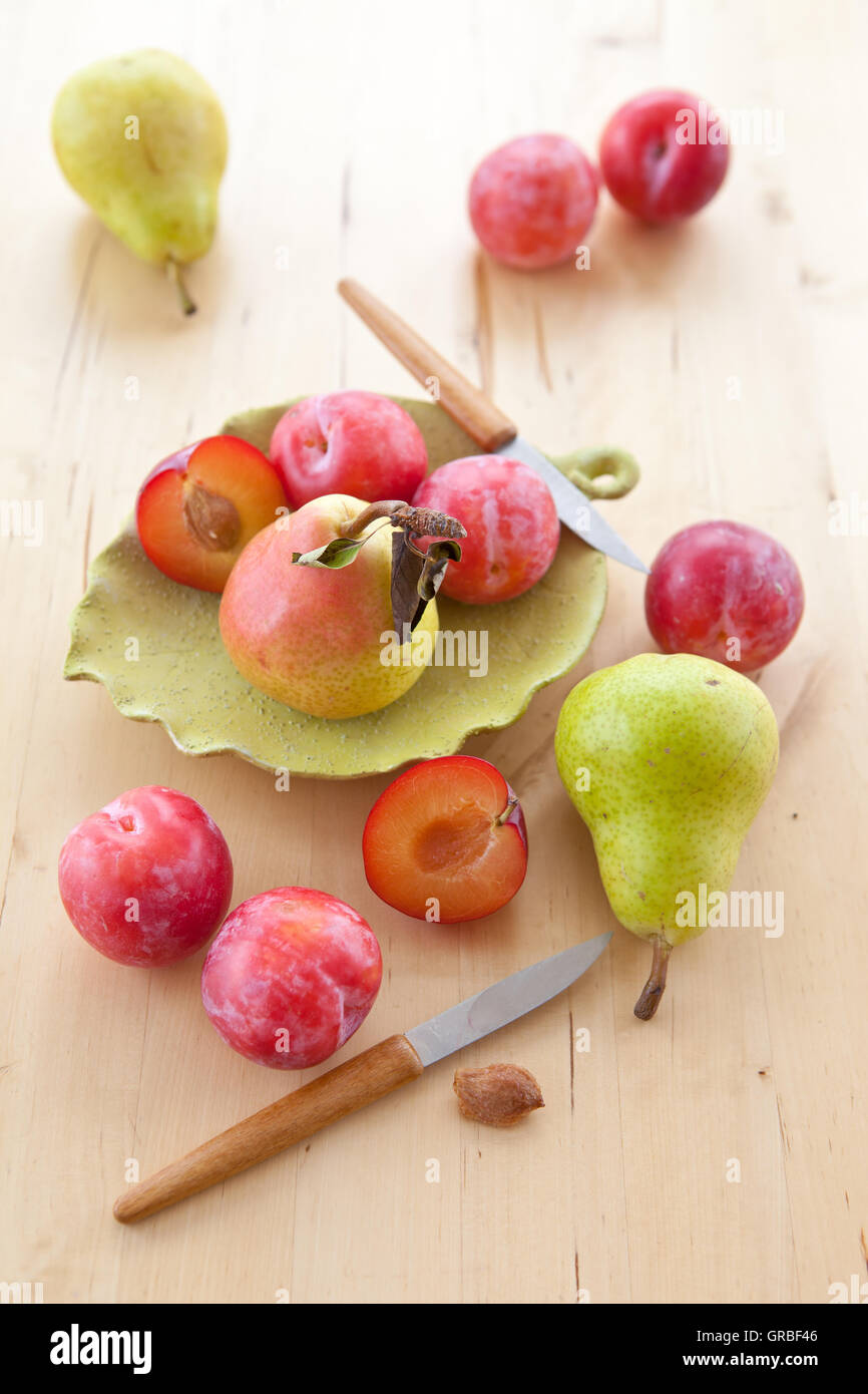 Fresh ripe plums, apples and pears Stock Photo - Alamy