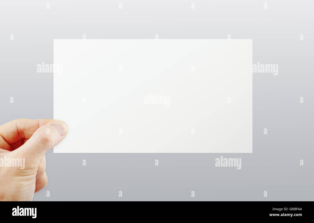 Hand holding paper Stock Photo - Alamy