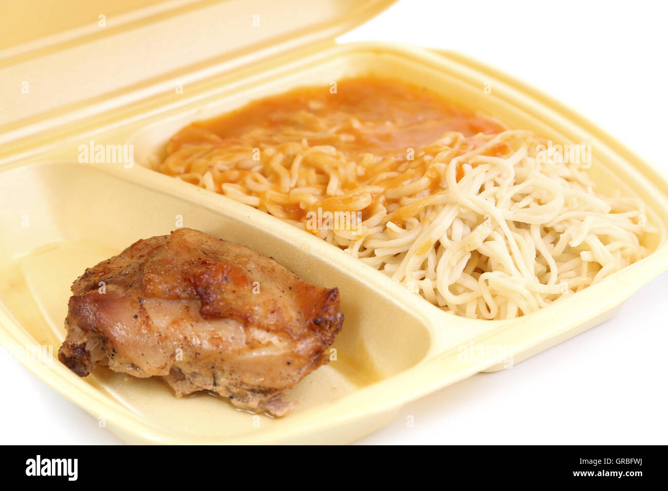 Chicken with pasta in food container Stock Photo - Alamy