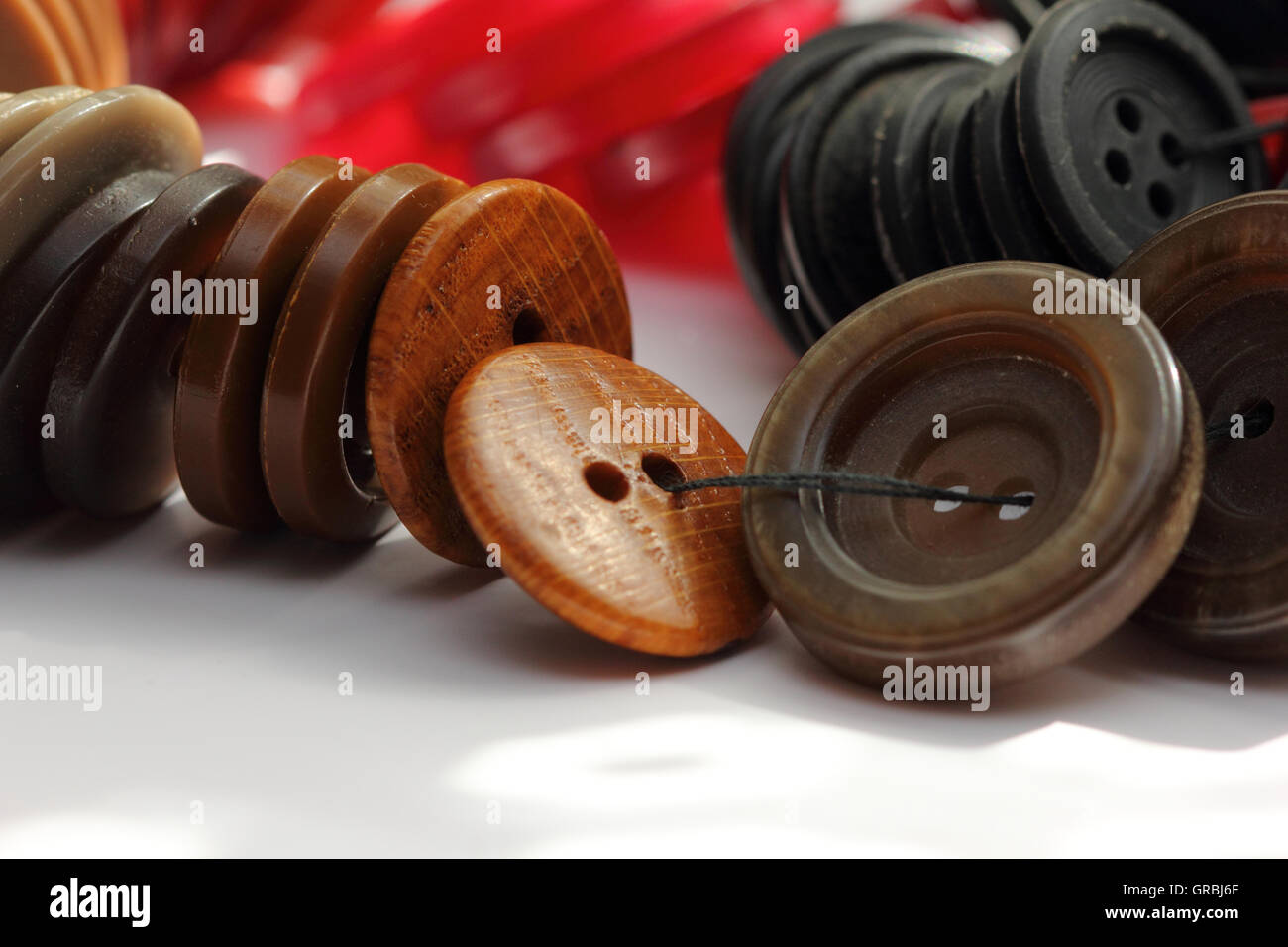 Fixing button hole hi-res stock photography and images - Alamy