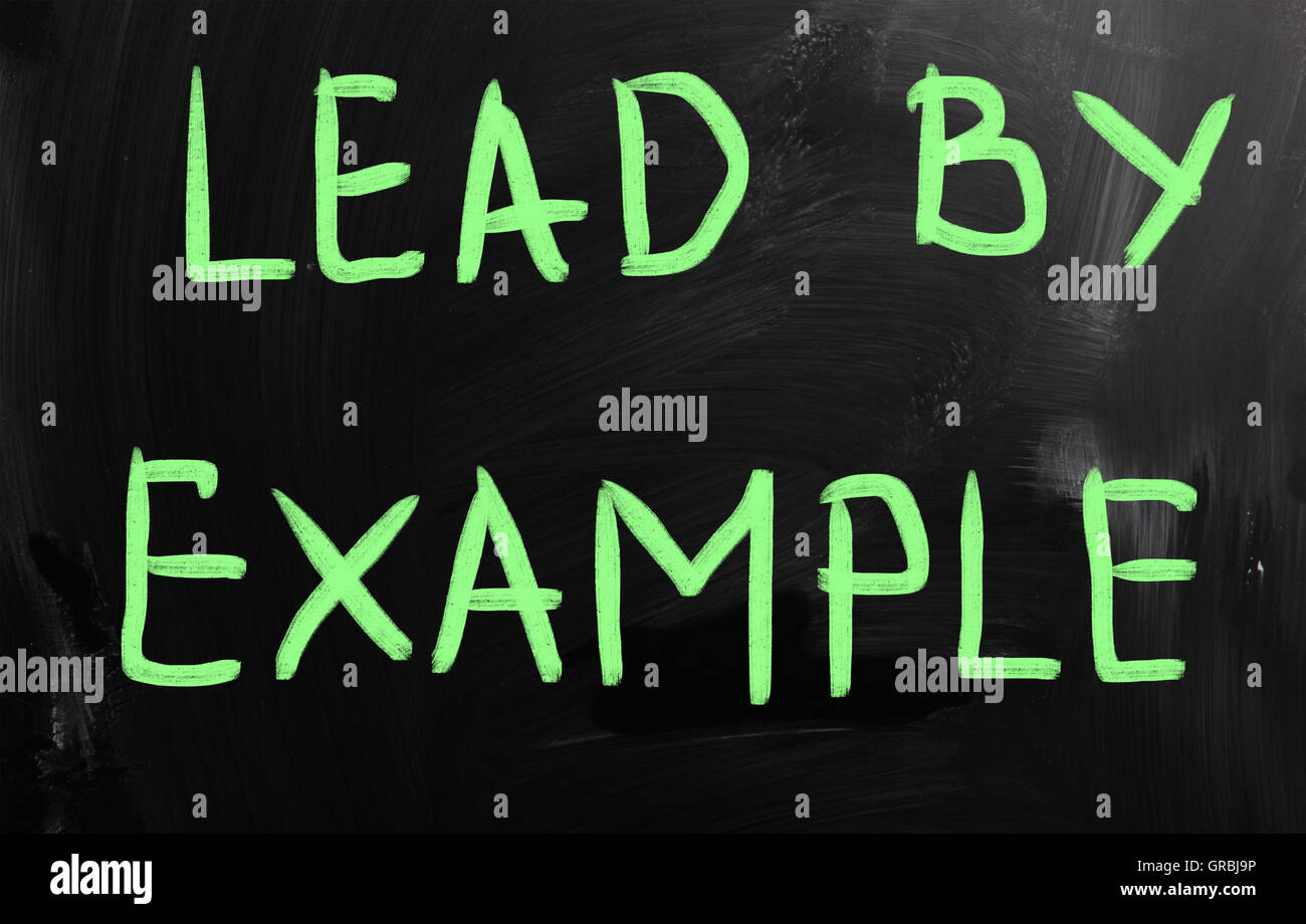 Lead by example handwritten with white chalk on a blackboard Stock ...
