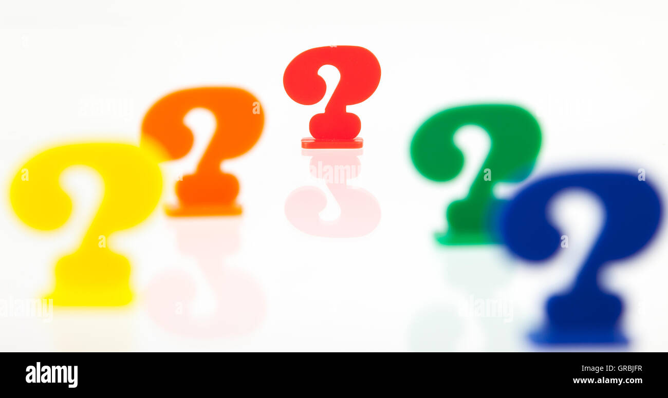 Different colored unique pawns isolated Stock Photo - Alamy