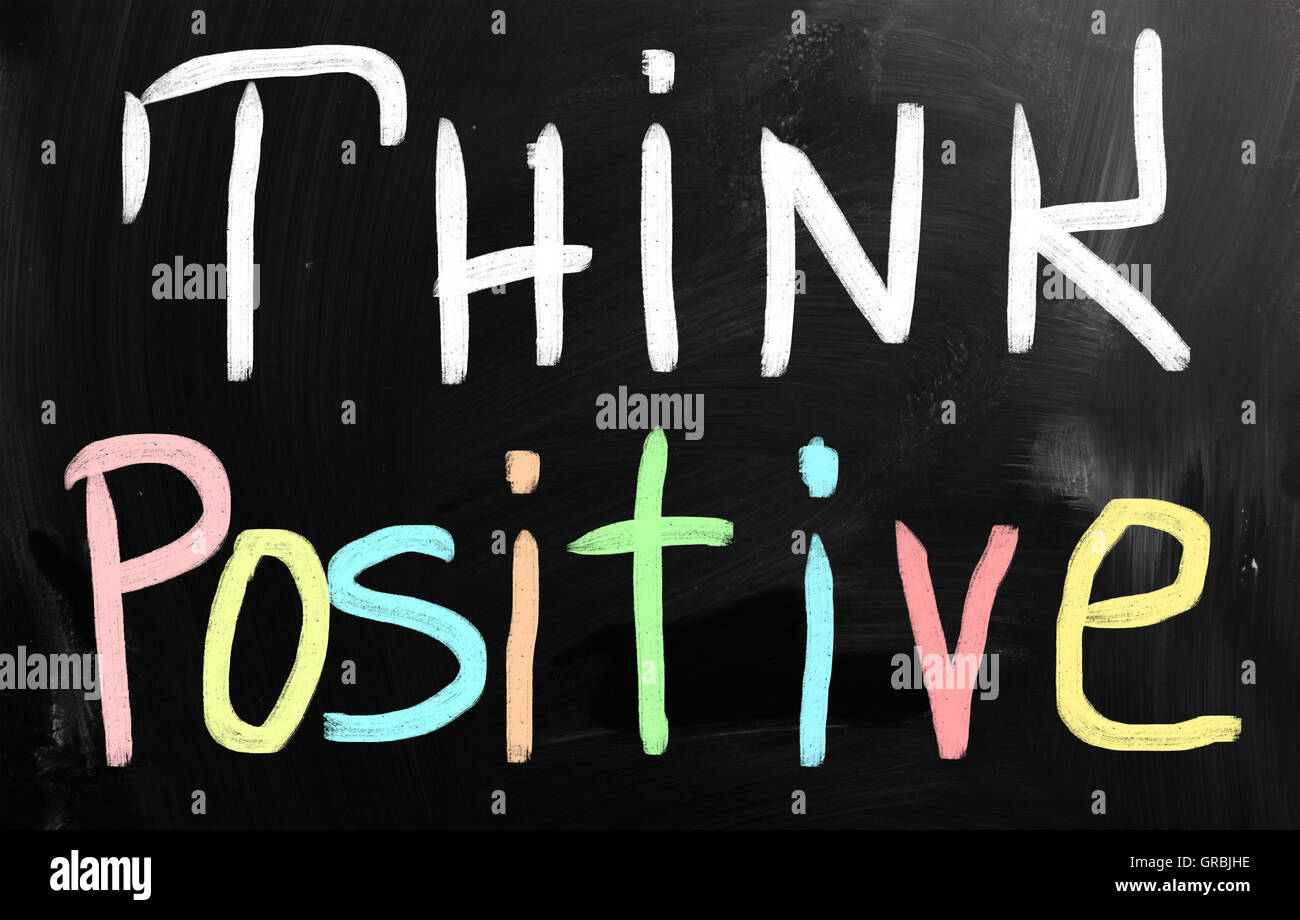 Think positive handwritten with white chalk on a blackboard Stock Photo ...