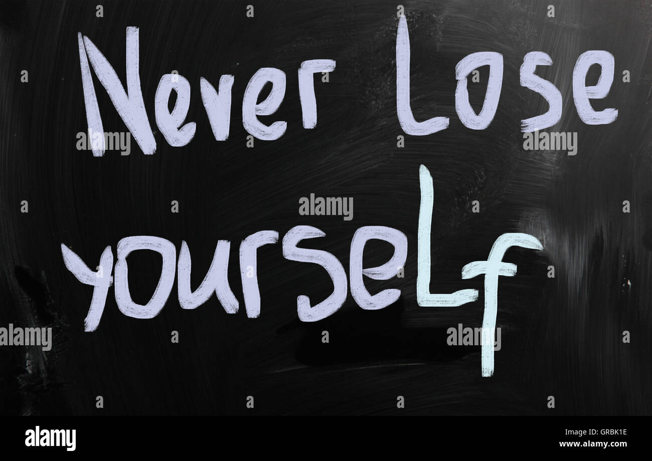 Never lose yourself handwritten with white chalk on a blackboa Stock ...