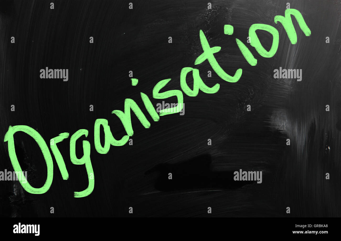 Organisation handwritten with white chalk on a blackboard Stock Photo ...