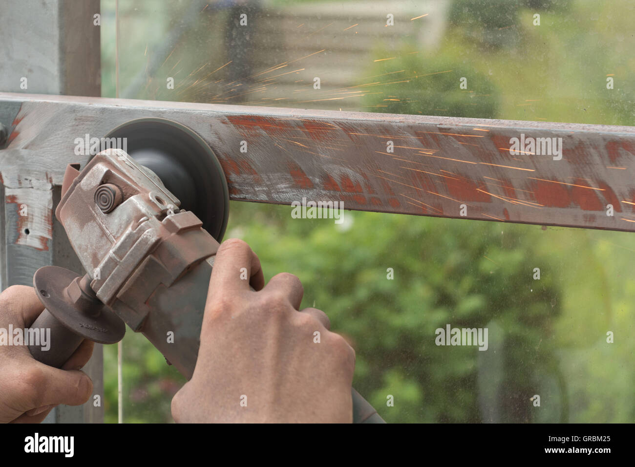 Person With Angle Grinder Grinds Metal Stock Photo - Alamy
