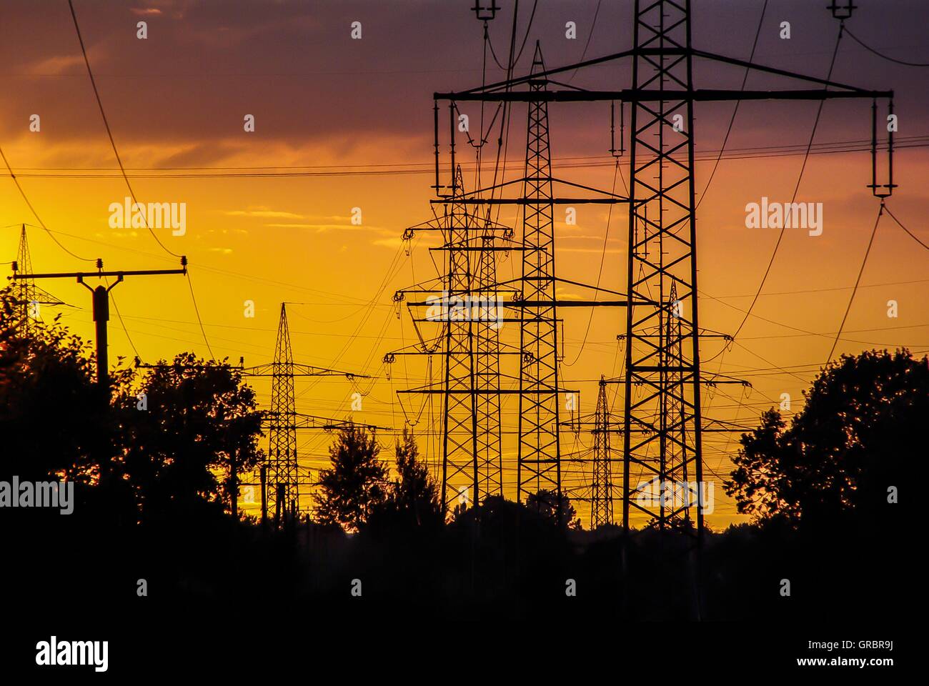 Overhead Lines In The Evening Light Stock Photo - Alamy