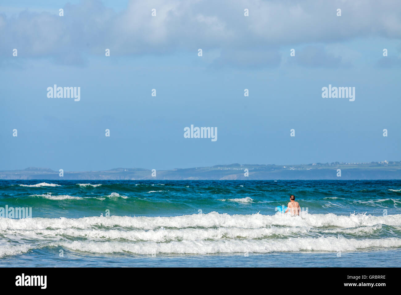 Body boarding on Druidstone Beach in Pembrokeshire Stock Photo - Alamy
