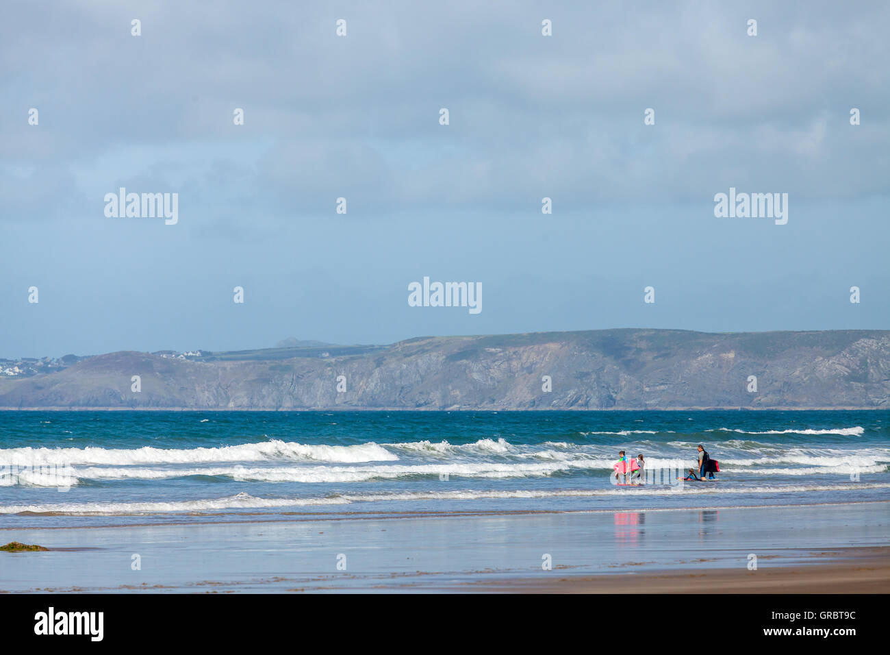 Body boarding on Druidstone Beach in Pembrokeshire Stock Photo - Alamy