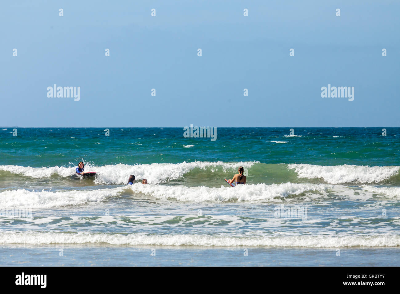 Body boarding on Druidstone Beach in Pembrokeshire Stock Photo - Alamy