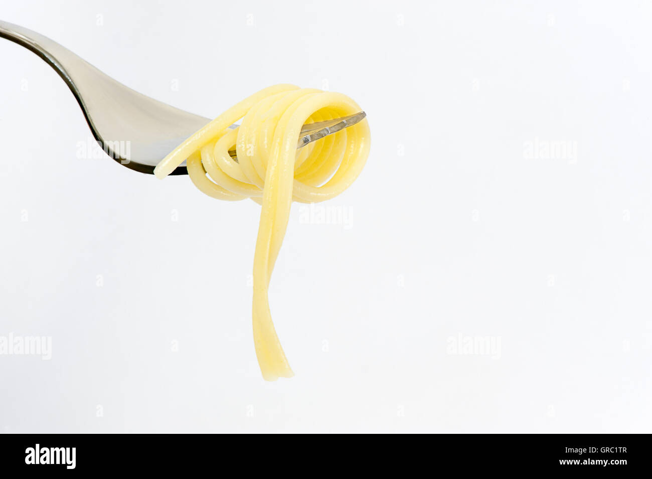 Spaghetti Pasta On A Fork Stock Photo - Alamy