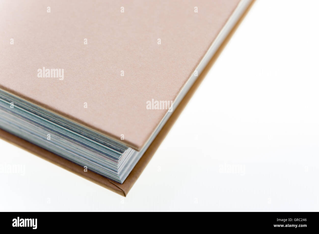 Closeup Of A Brown Book On White Background Stock Photo - Alamy