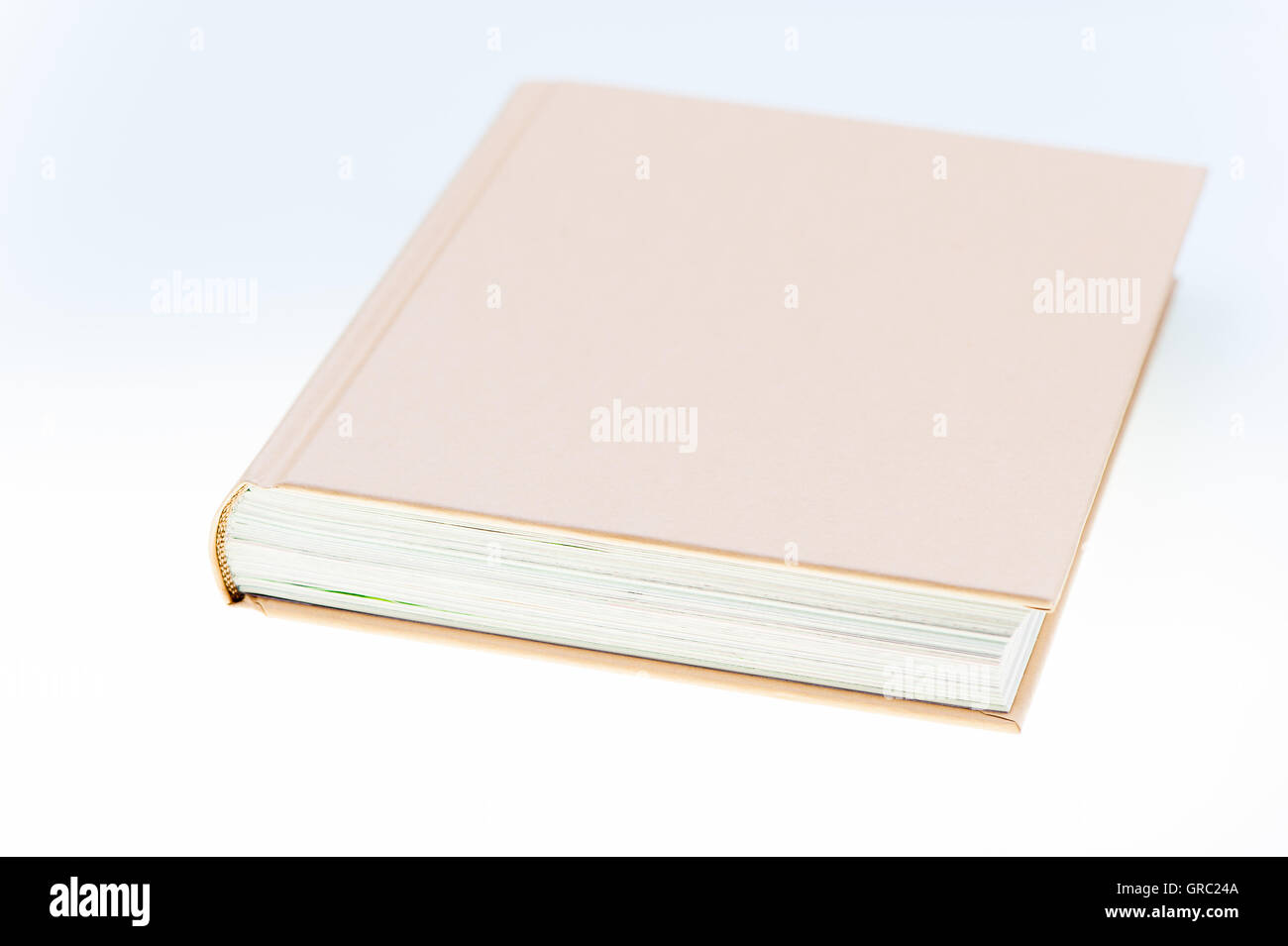 Closeup Of A Brown Book On White Background Stock Photo - Alamy