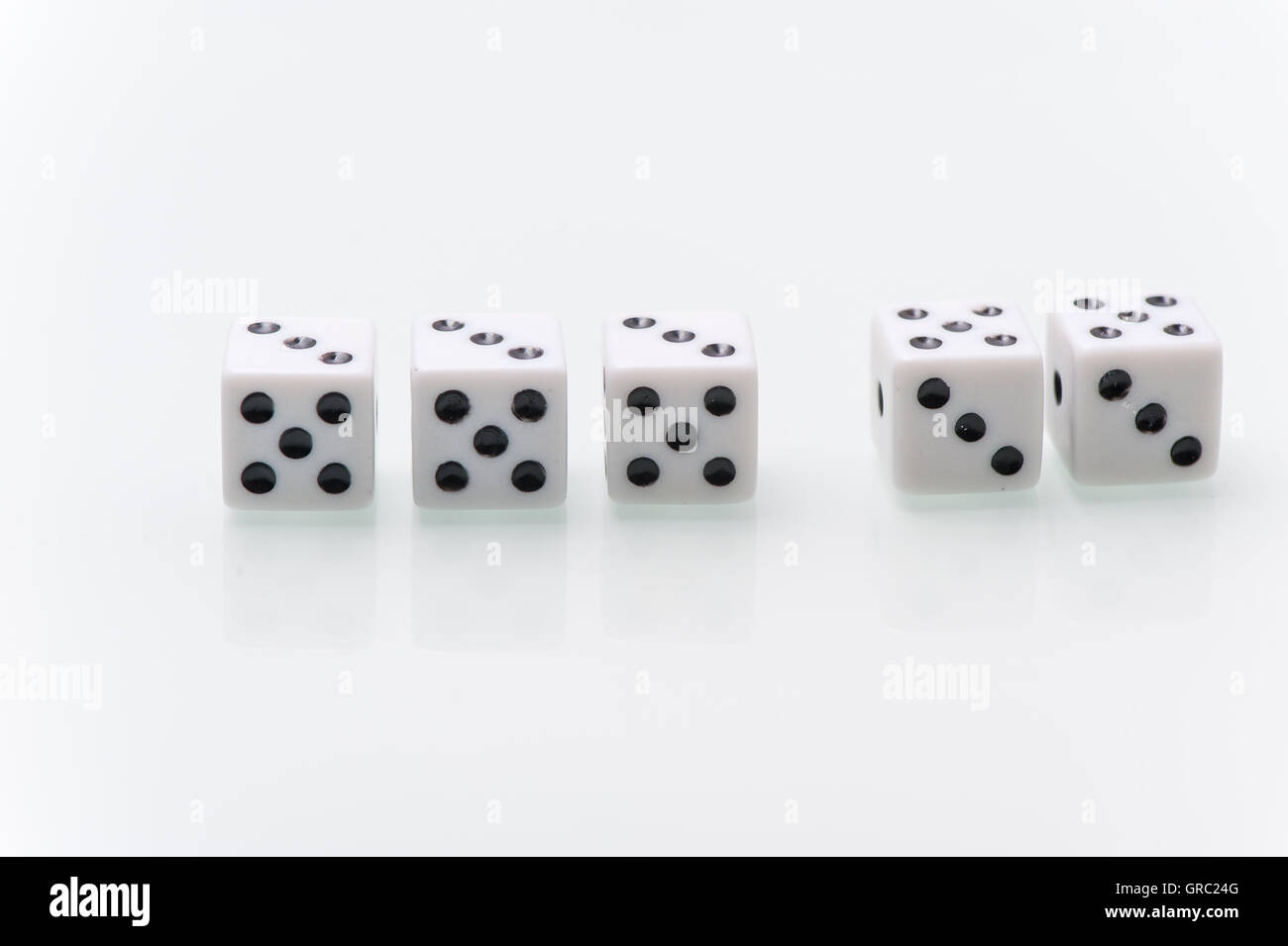 5 White Dice On White Background , Closeup Stock Photo - Alamy