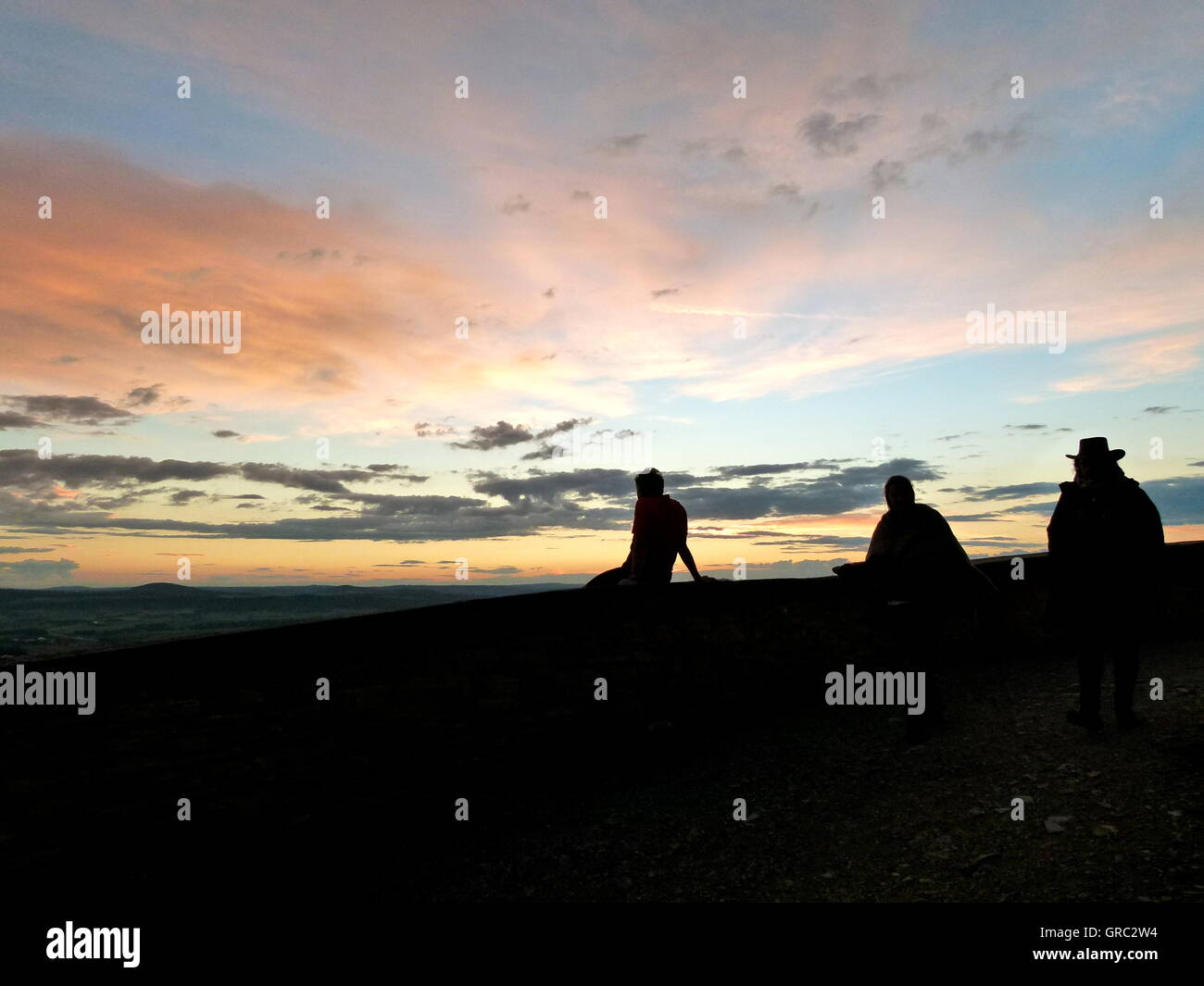 Watching The Sunset Stock Photo - Alamy