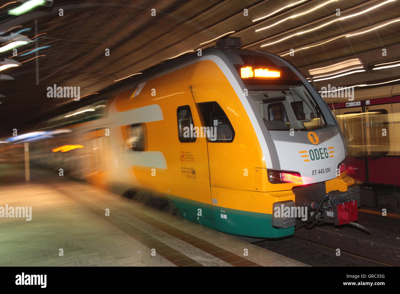 Commuter train passing railway hi-res stock photography and images - Alamy