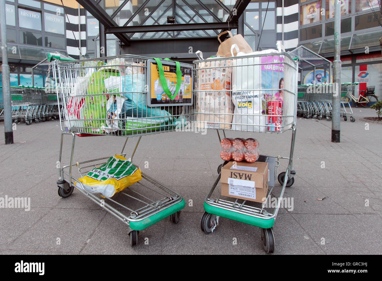 Overloaded Shopping Carts Stock Photo - Alamy