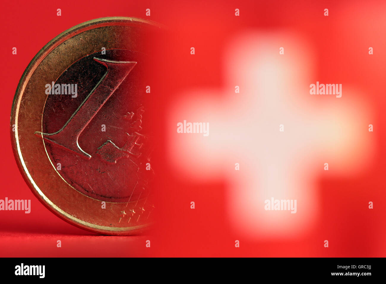 Euro Coin And Swiss Flag Stock Photo - Alamy
