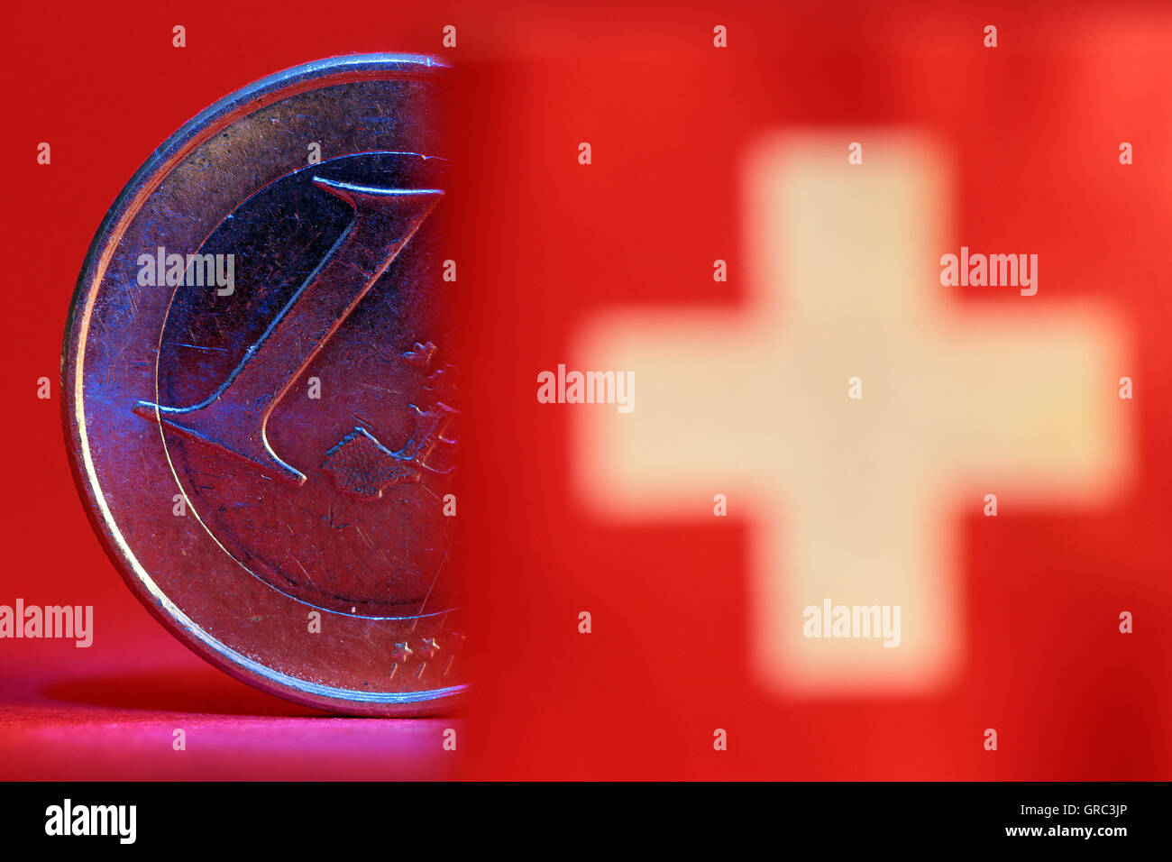 Euro Coin And Swiss Flag Stock Photo - Alamy