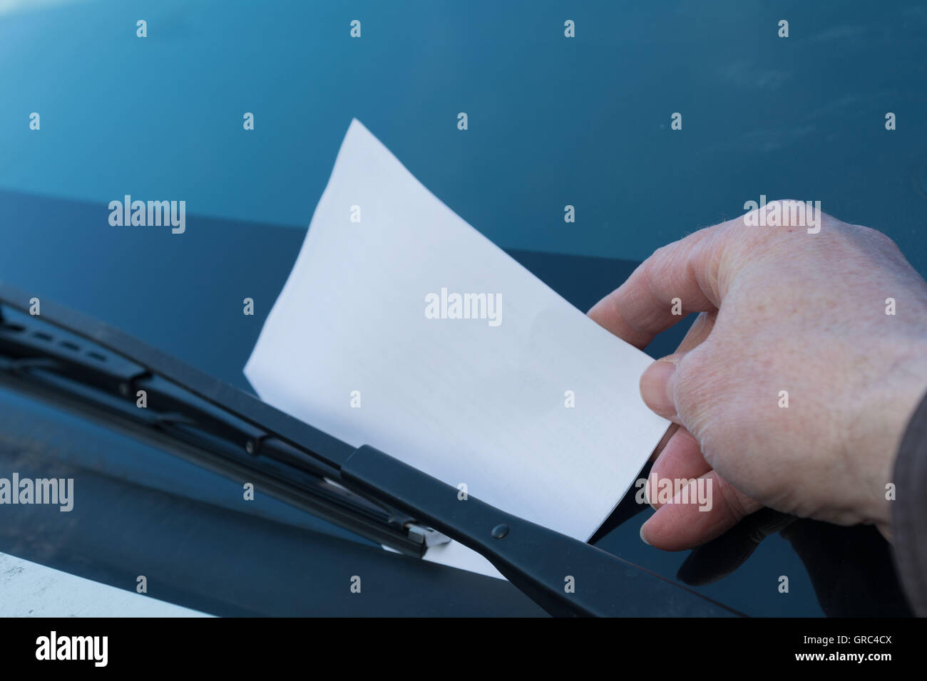 Ticket Is Attached To Windshield Stock Photo - Alamy