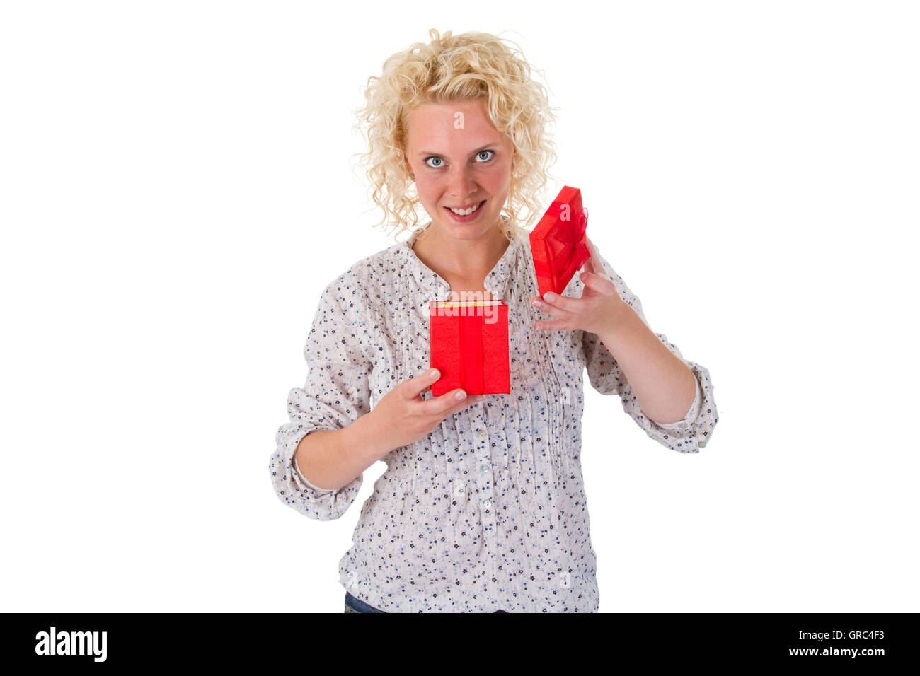 Young Woman Opening A Red Gift Box Stock Photo - Alamy