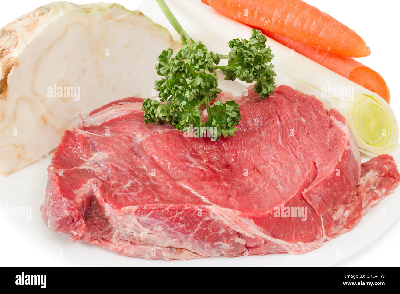 Boiling Meat With Soup Greens On A Plate Stock Photo - Alamy