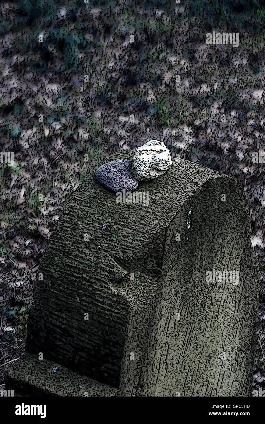 Small Stone On Grave Stone Stock Photo - Alamy