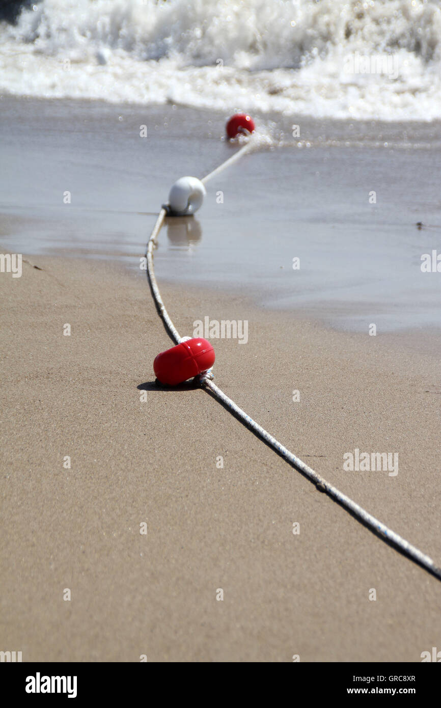 Rope On The Beach Stock Photo - Alamy