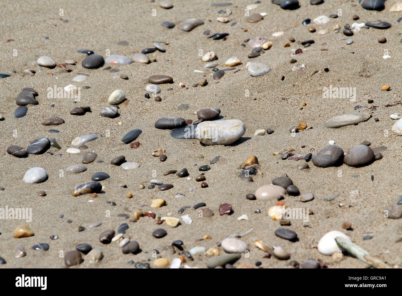 Stones On The Beach Stock Photo - Alamy