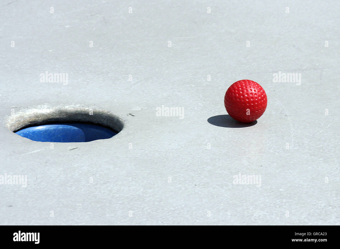 Red Mini Golf Ball Stock Photo - Alamy
