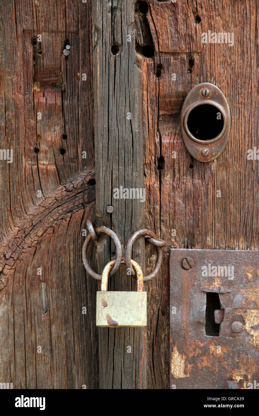 Padlock On A Gate Stock Photo - Alamy