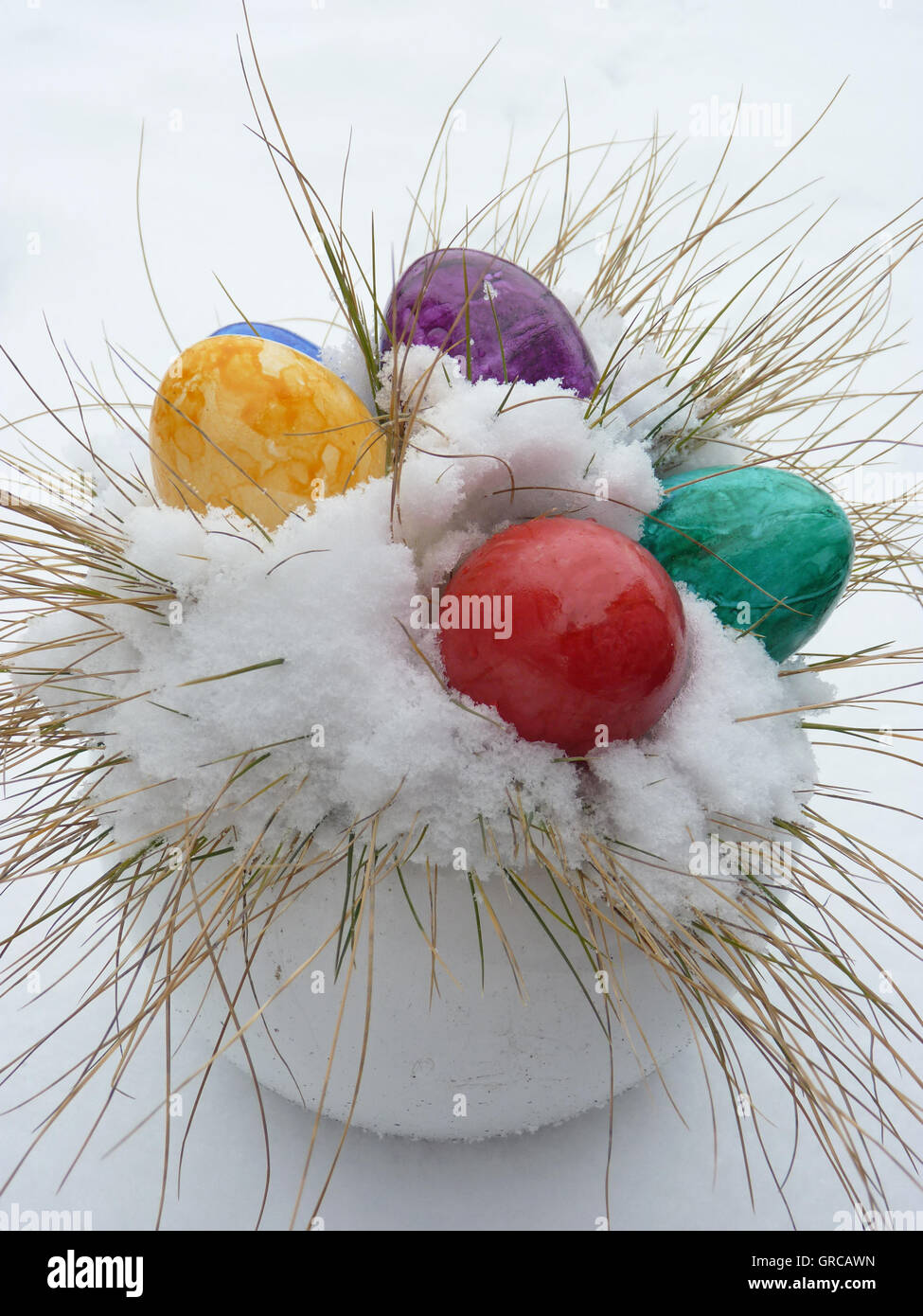 Coloured Easter Eggs Lying In Snow, Symbol Of Easter In Snow Stock ...
